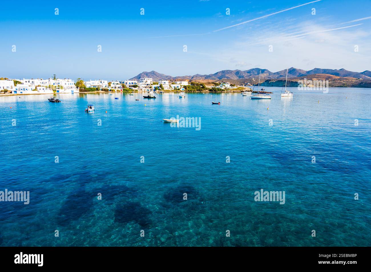 View of sea and Pollonia port houses from deck ferry from Kimolos ...