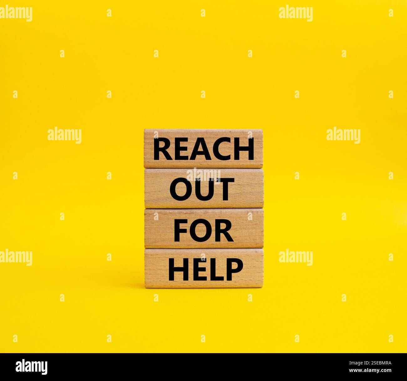 Reach out for help symbol. Wooden blocks with words Reach out for help ...