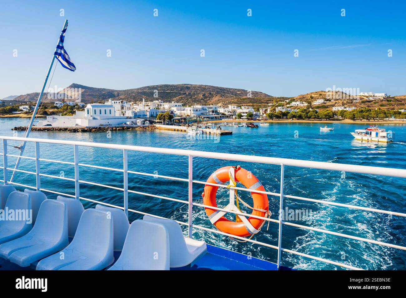 View of sea and Pollonia port houses from deck ferry from Kimolos ...