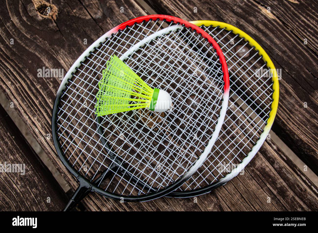 Sports equipment for badminton. Badminton racket and bright green ...