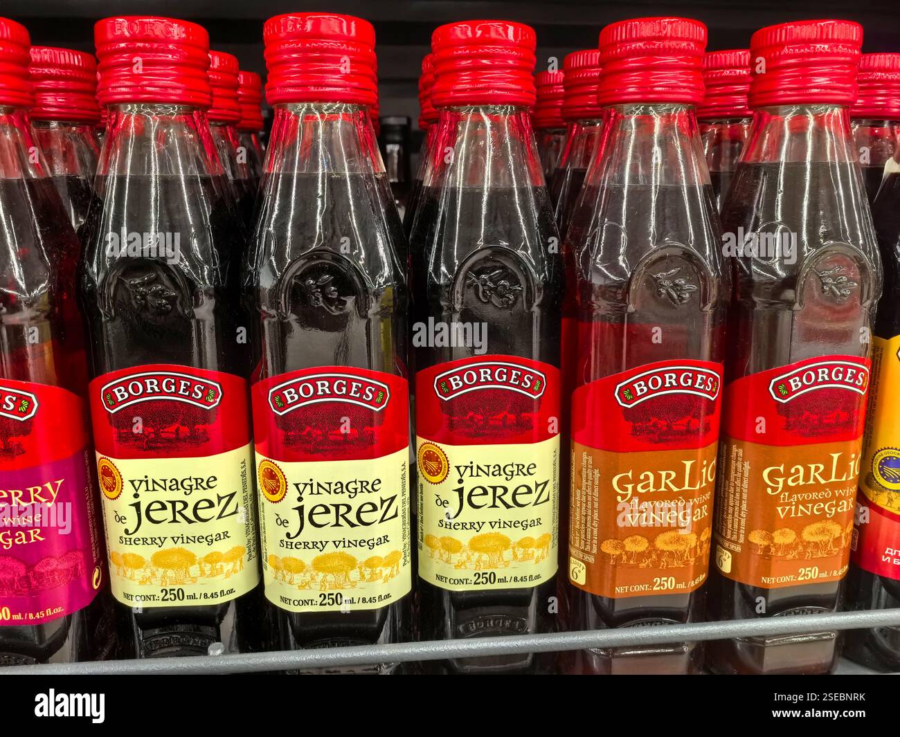 Bobruisk, Belarus - 4 February 2025: Shelves lined with vibrant bottles ...