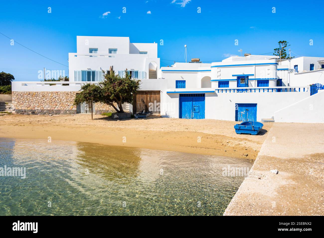 Beautiful sandy beach in Pollonia port, Milos island, Cyclades, Greece ...
