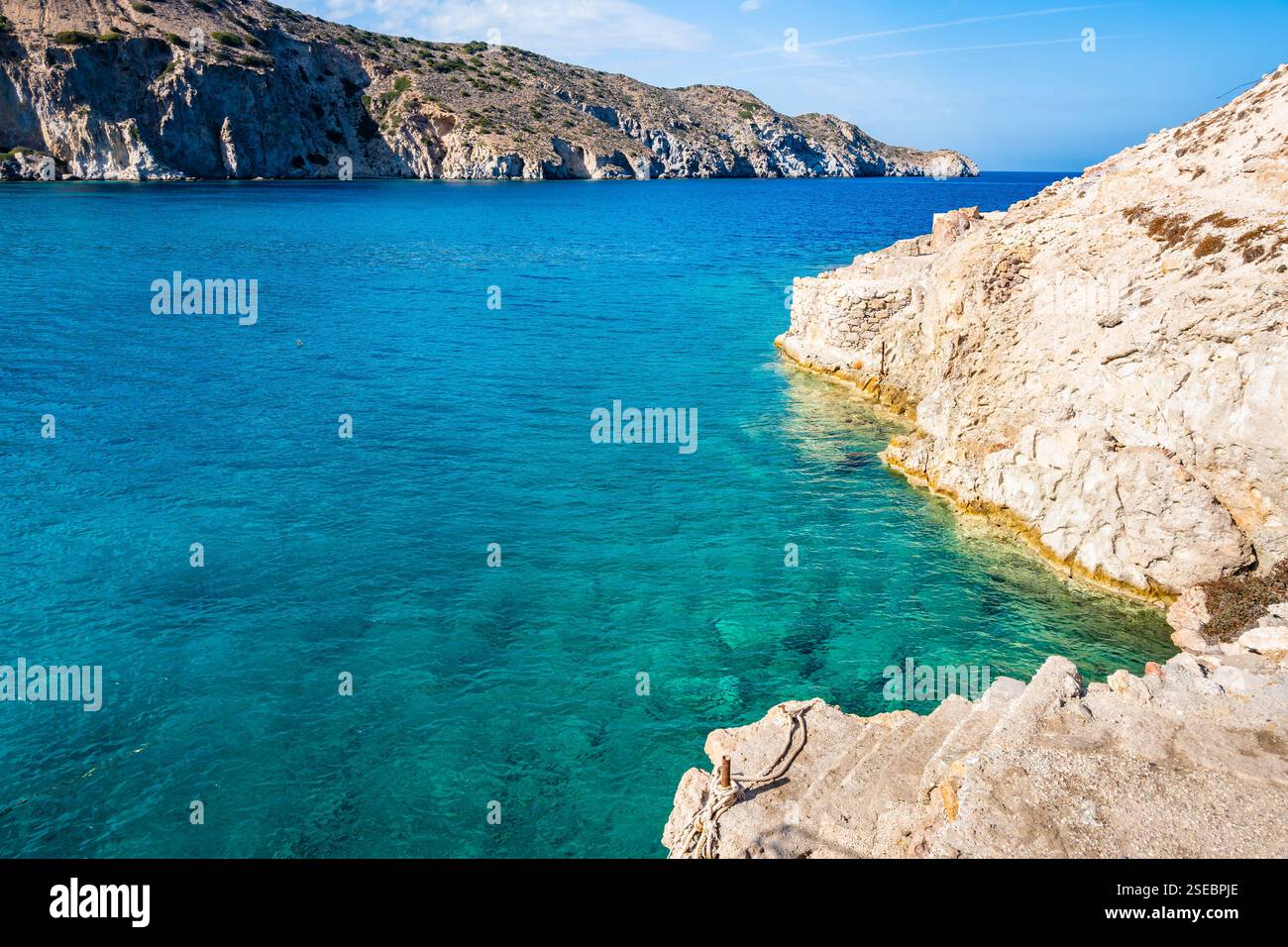 Beautiful azure sea in Firopotamos bay, Milos island, Cyclades, Greece ...