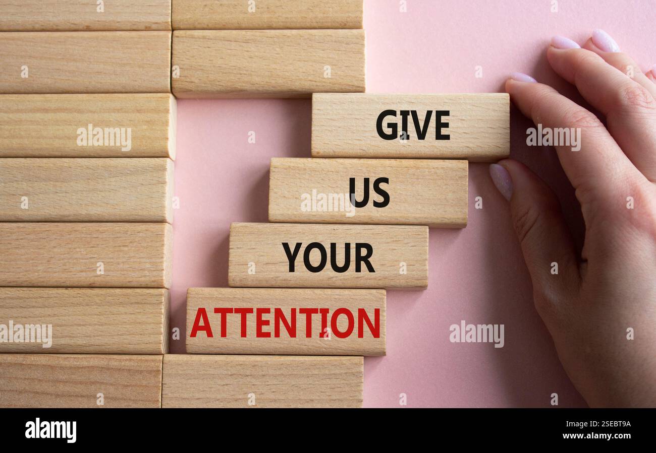 Attention symbol. Concept word Give us your attention on wooden blocks ...