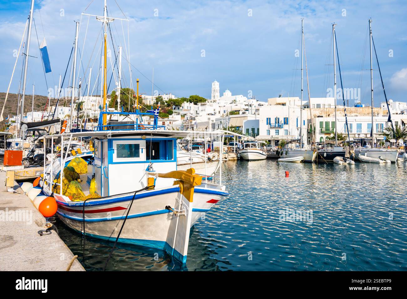 Traditional Greek fishing boat in Adamas port, Milos island, Cyclades ...