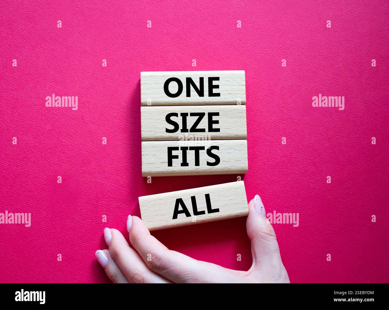 One size fits all symbol. Concept words One size fits all on wooden ...