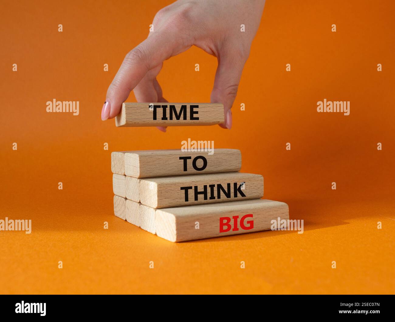 Time to think big symbol. Wooden blocks with words Time to think big ...