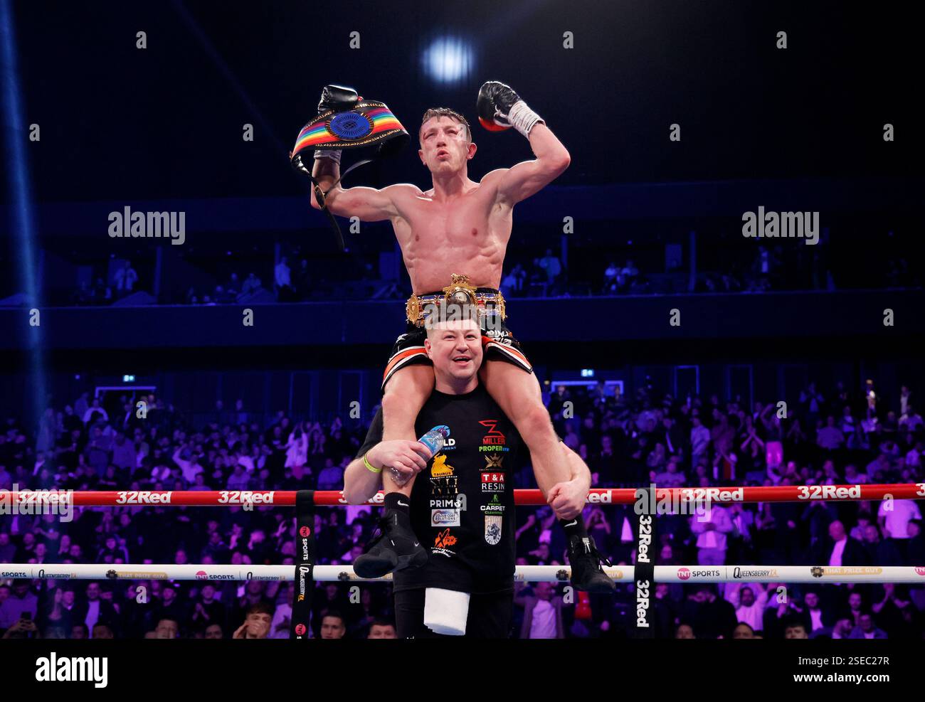 Zak Miller celebrates winning their featherweight bout against Masood ...