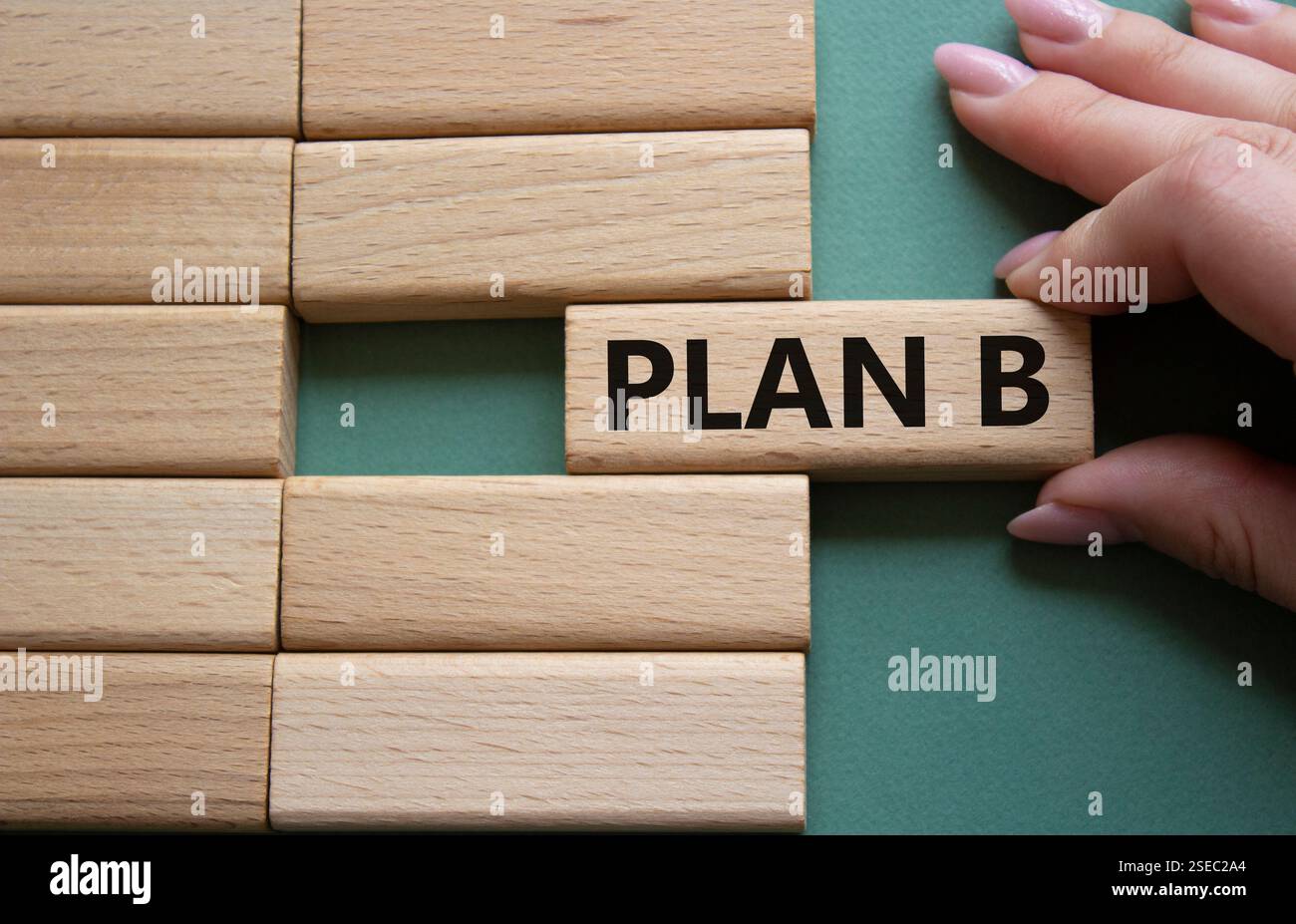 Plan B symbol. Concept word Plan B on wooden blocks. Beautiful grey green background ...