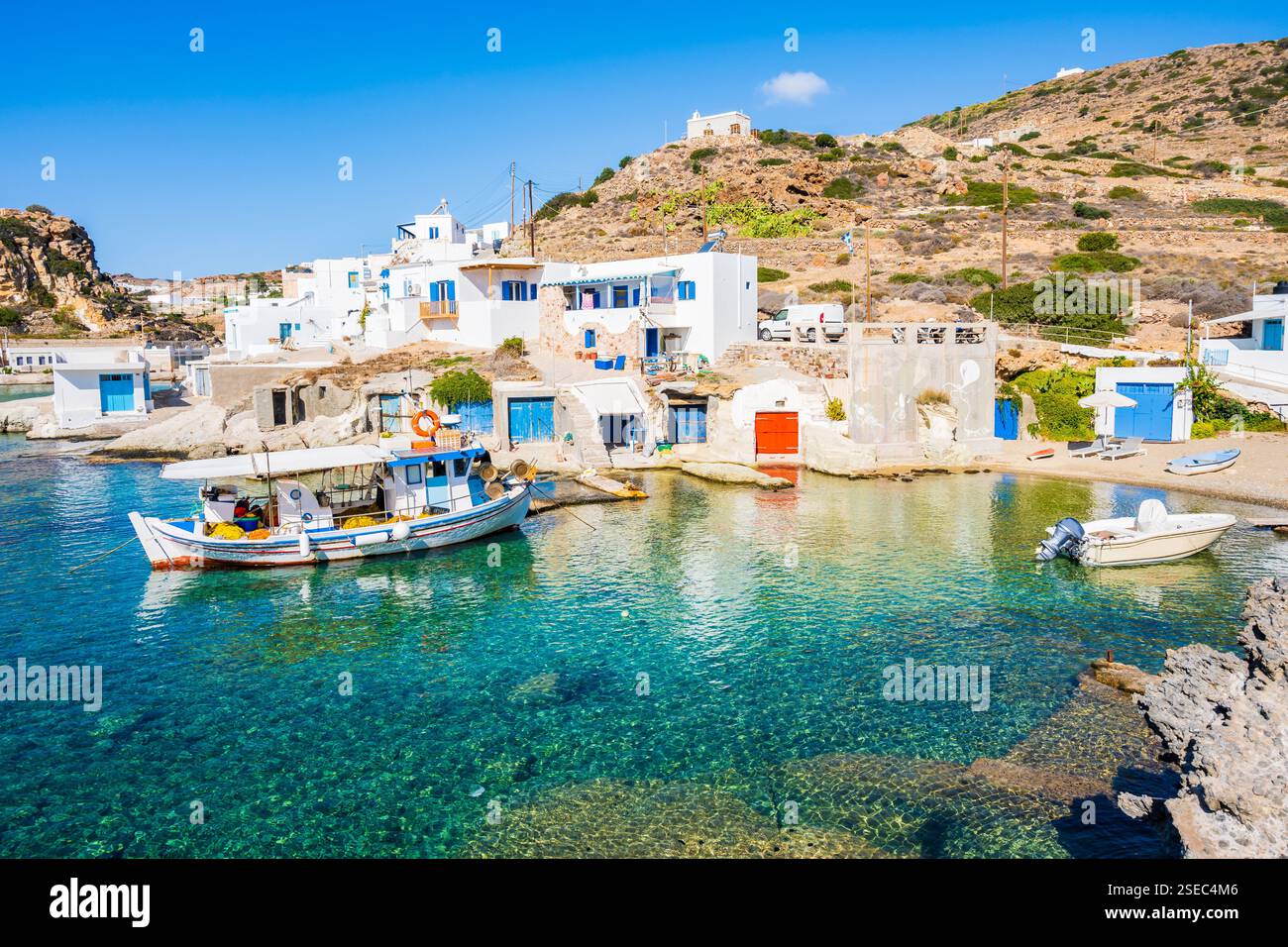 Fishing boat at Rema beach in beautiful sea bay, Kimolos island ...