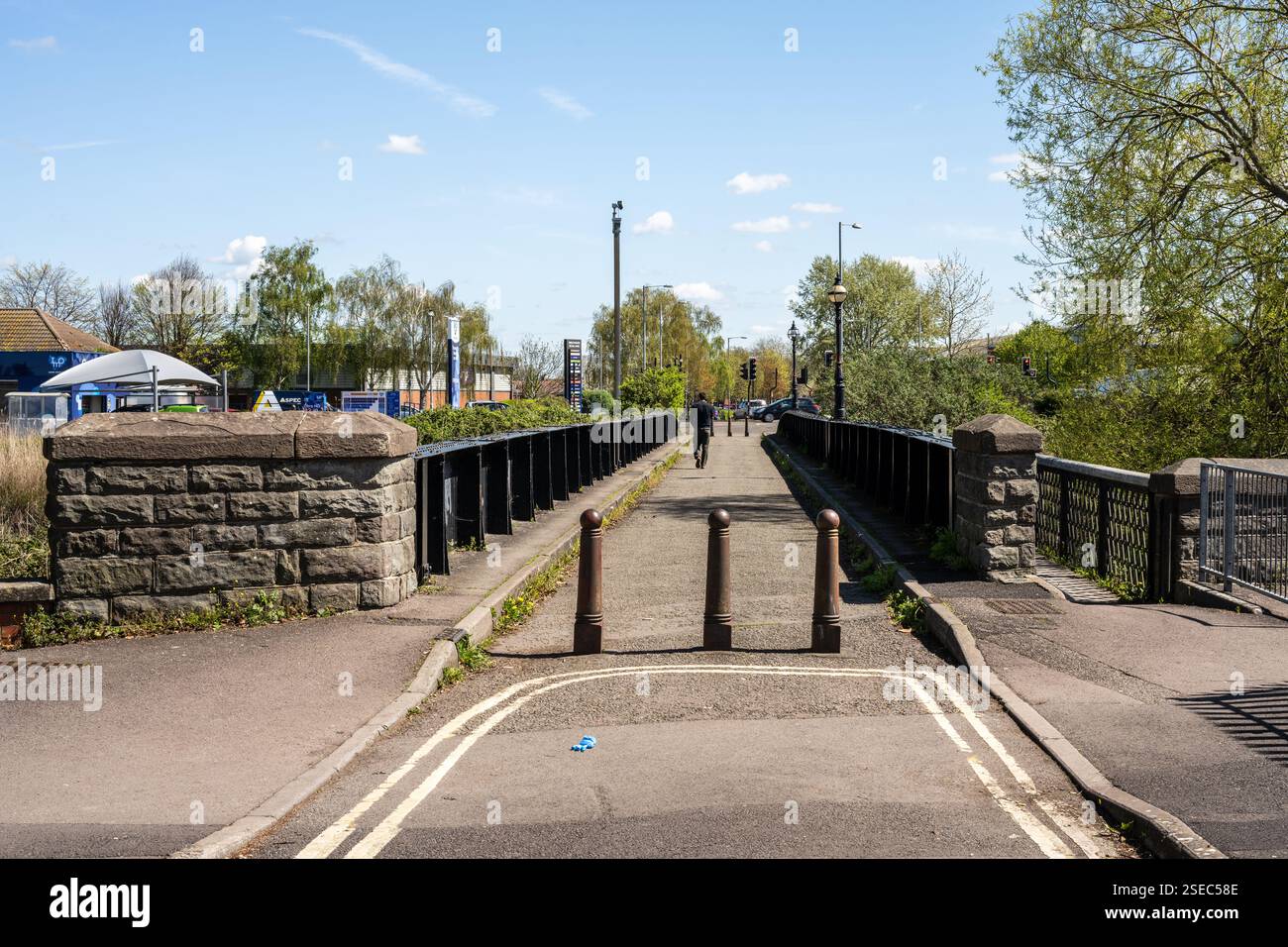 A pedestrian walks across the Telescopic Bridge, a disused Victorian ...