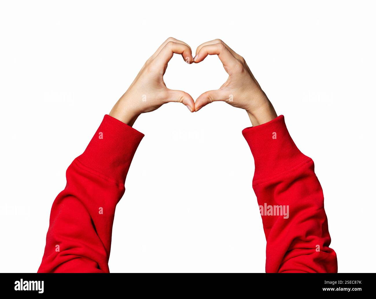 Isolated female hands in red sleeves making heart gesture. Female ...