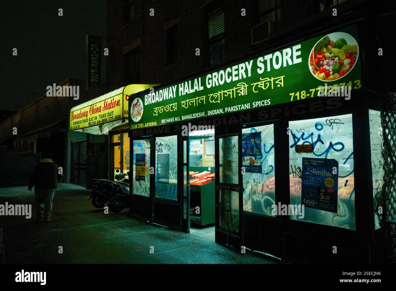 Ittadi Grocery store at night in Astoria, Queens, New York City Stock ...