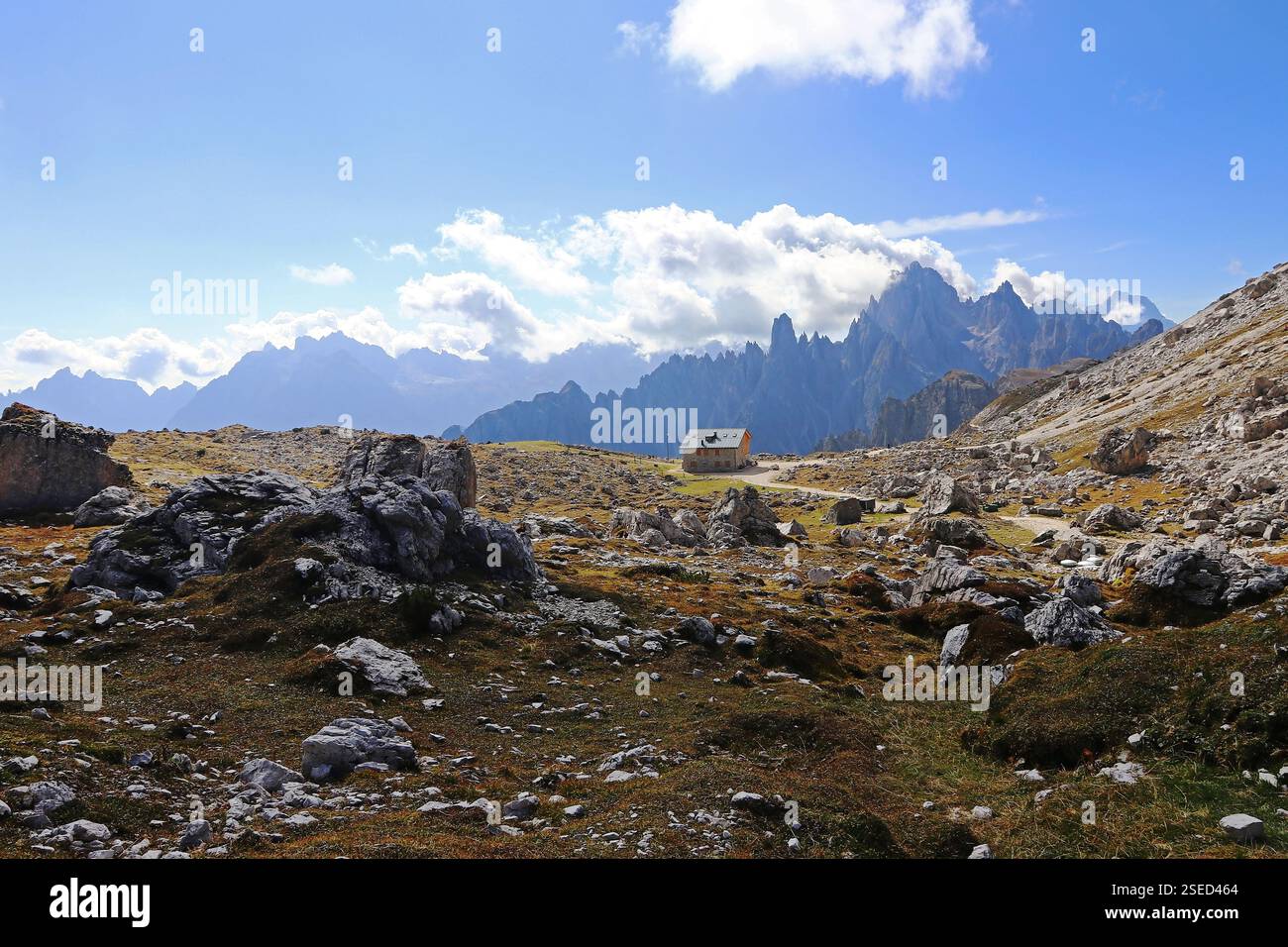 Mountain hut and refuge for hikers at the Three Peaks in the Dolomites ...