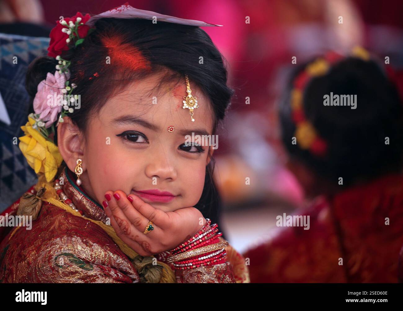 February 8, 2025: Kathmandu, Nepal: A small girl from Newar community ...