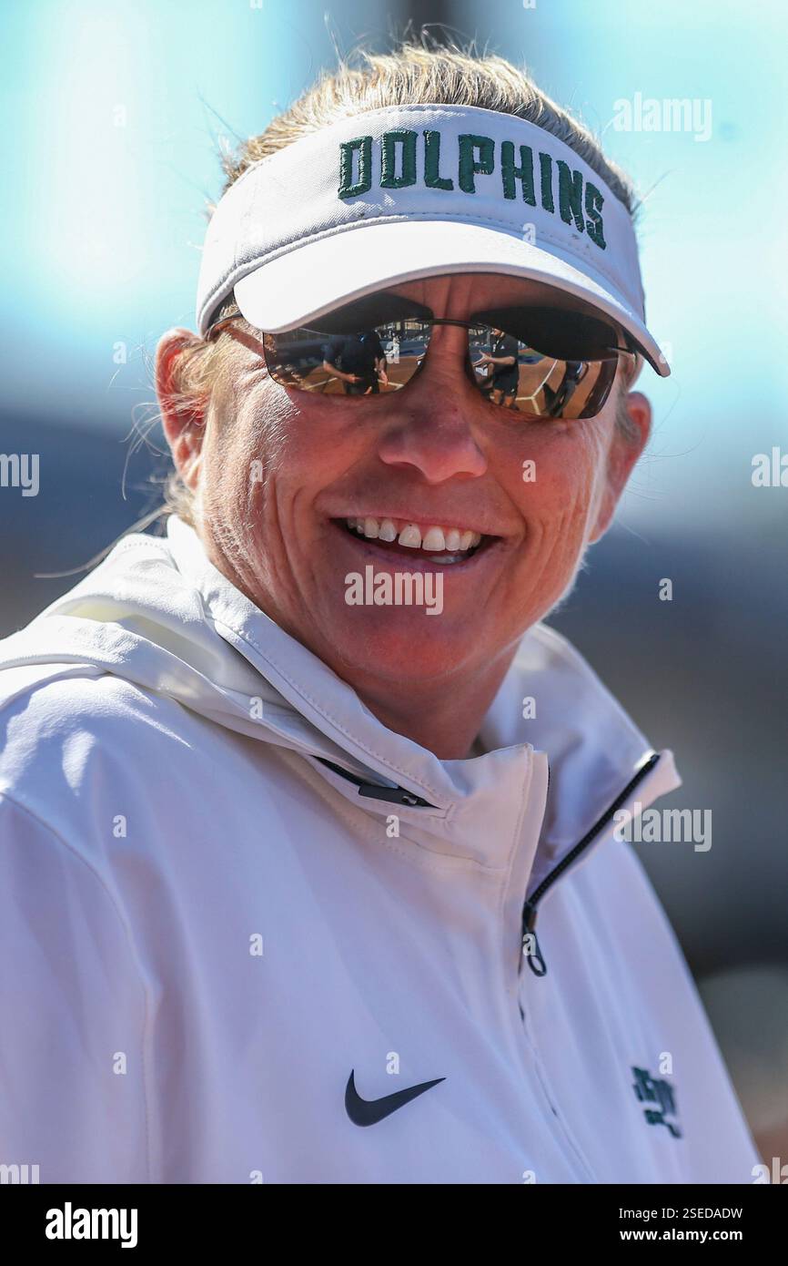 Jacksonville head coach Erica Ayers meets with officials before an NCAA ...