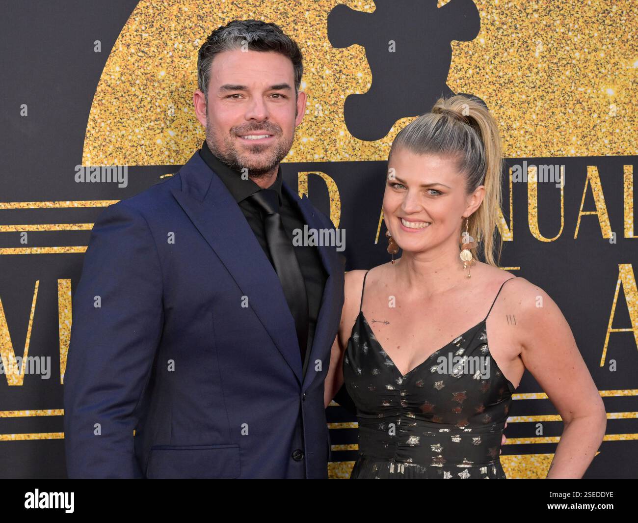 February 7, 2025, Hollywood, California, USA: Ken Daurio and Michelle ...