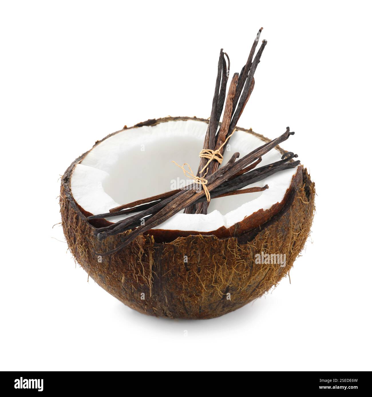 Coconut with vanilla pods isolated on white Stock Photo - Alamy