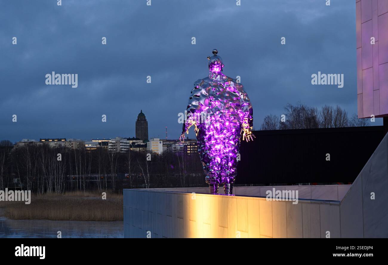 A striking contemporary sculpture illuminated with purple light, set ...