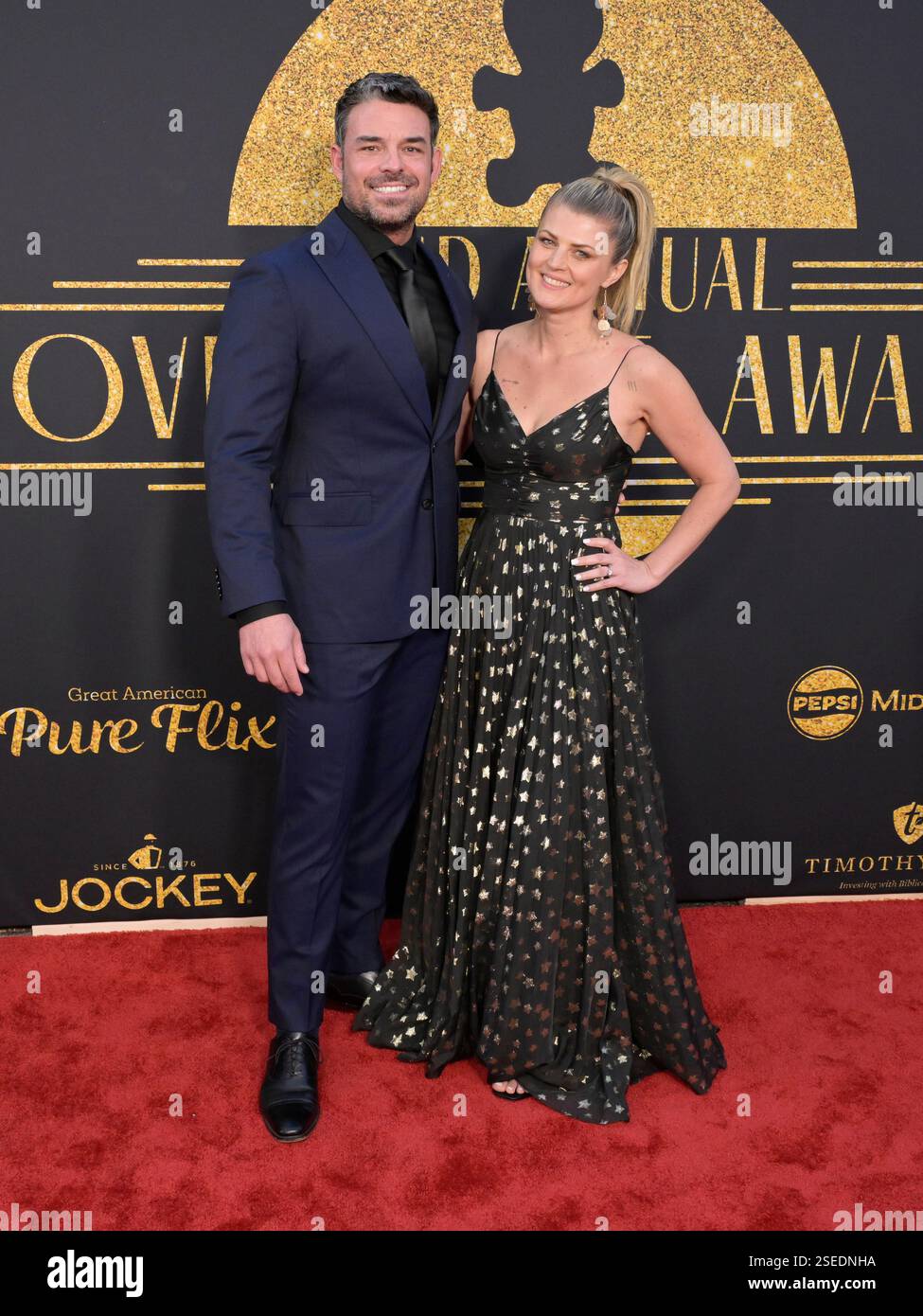 Hollywood, California, USA. 07th Feb, 2025. Ken Daurio and Michelle ...