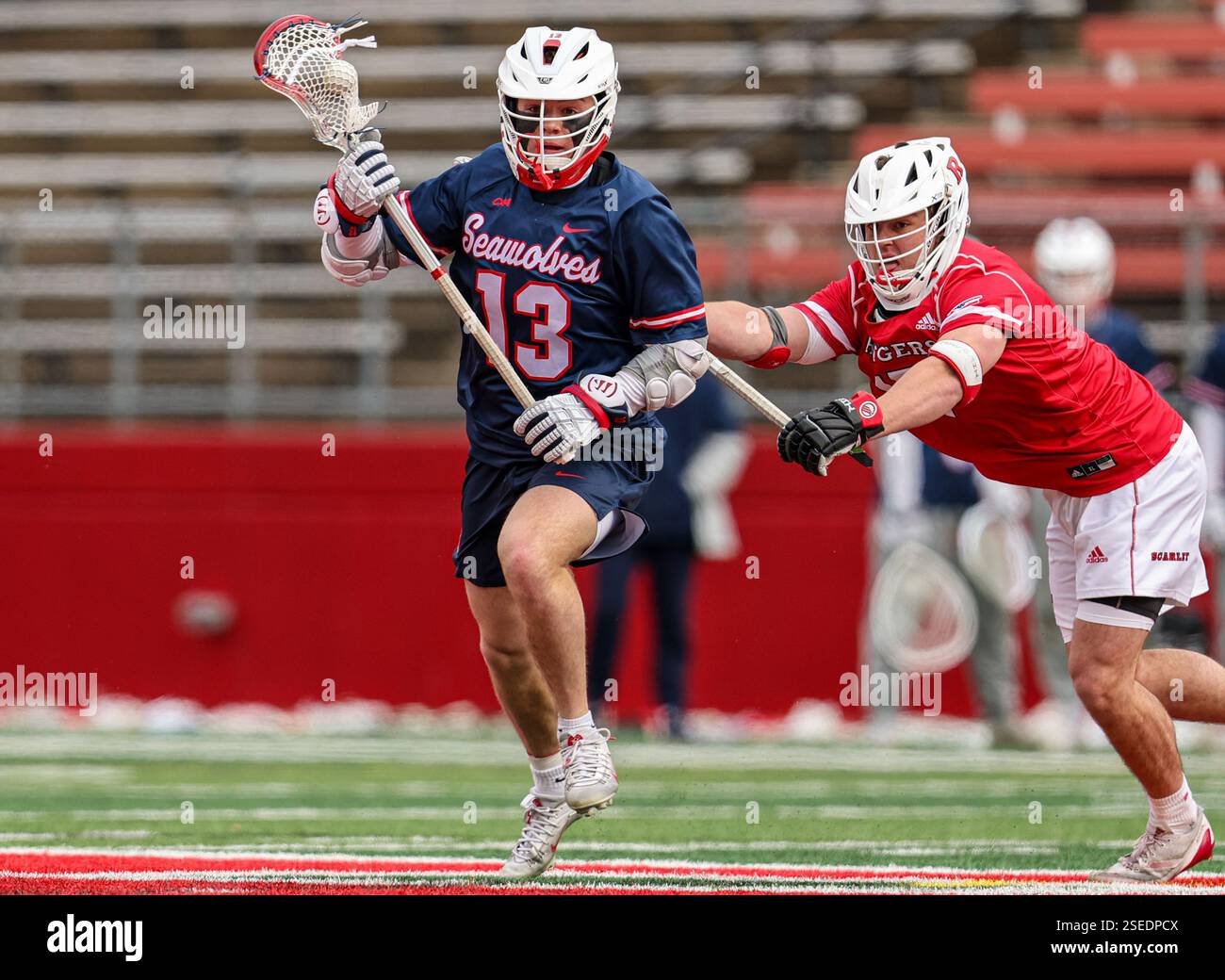 Piscataway, NJ, USA. 08th Feb, 2025. Stony Brook goalie Joey Greco (13 ...