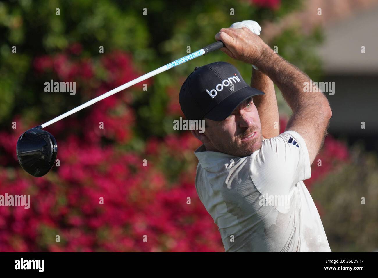 Nick Taylor, of Canada, hits his tee shot at the second hole during the ...