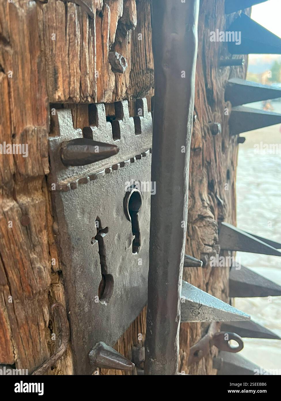 medieval castle keyhole and metal spikes Stock Photo - Alamy