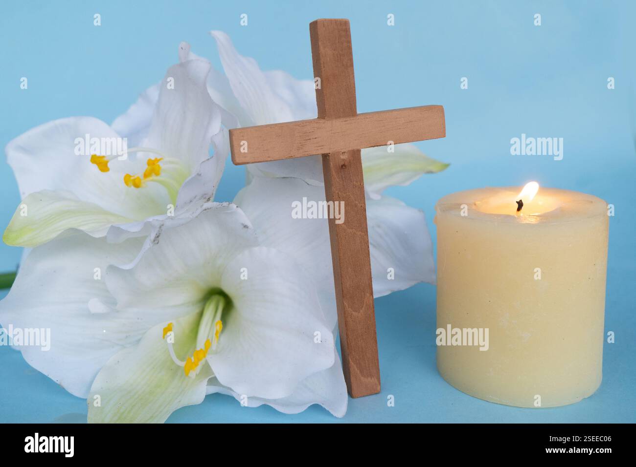 Simple design of an Easter cross with lilies Stock Photo - Alamy
