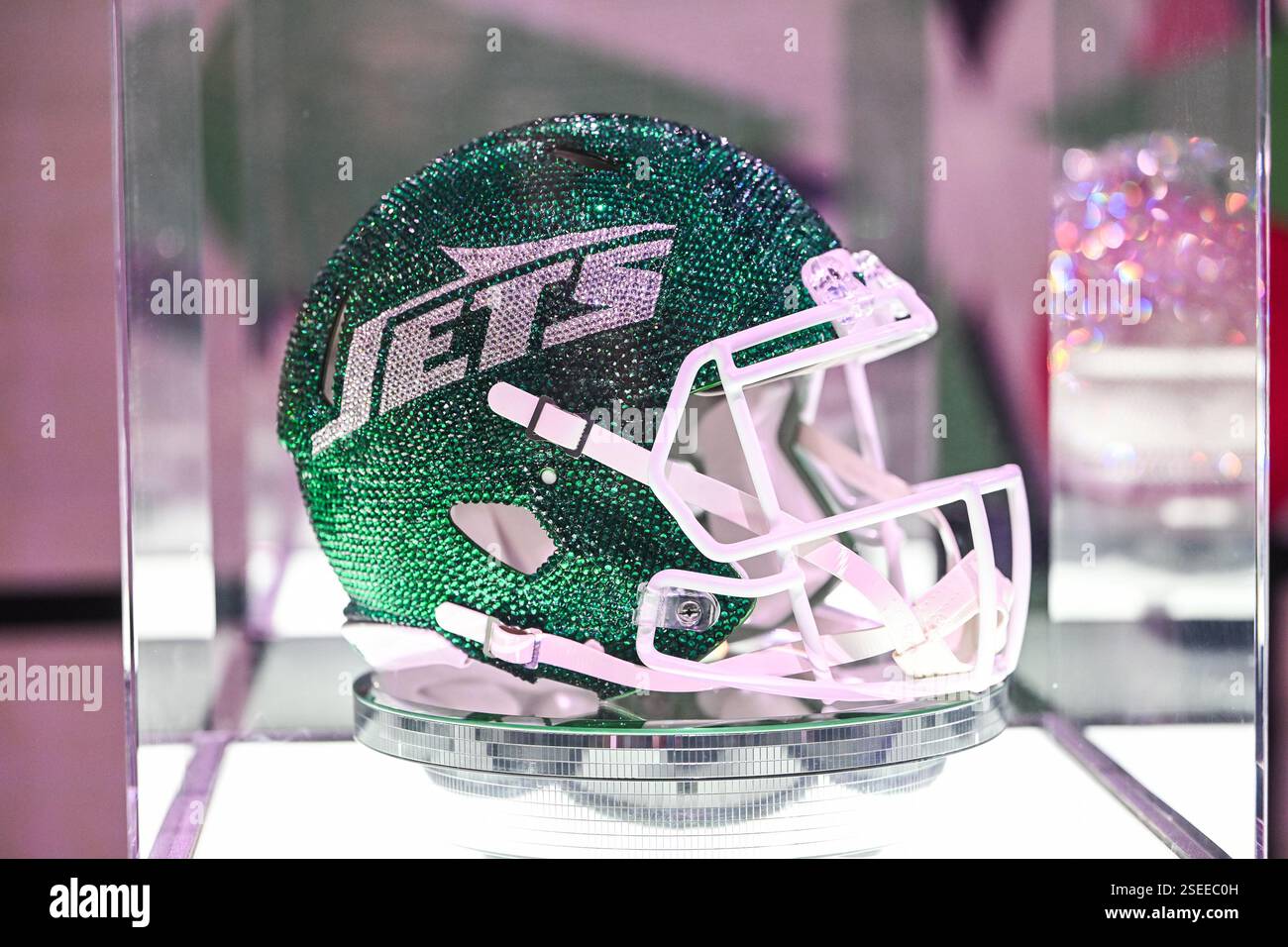 NFL helmets covered in jewels on display in the NFL Super Bowl LIX Fan ...