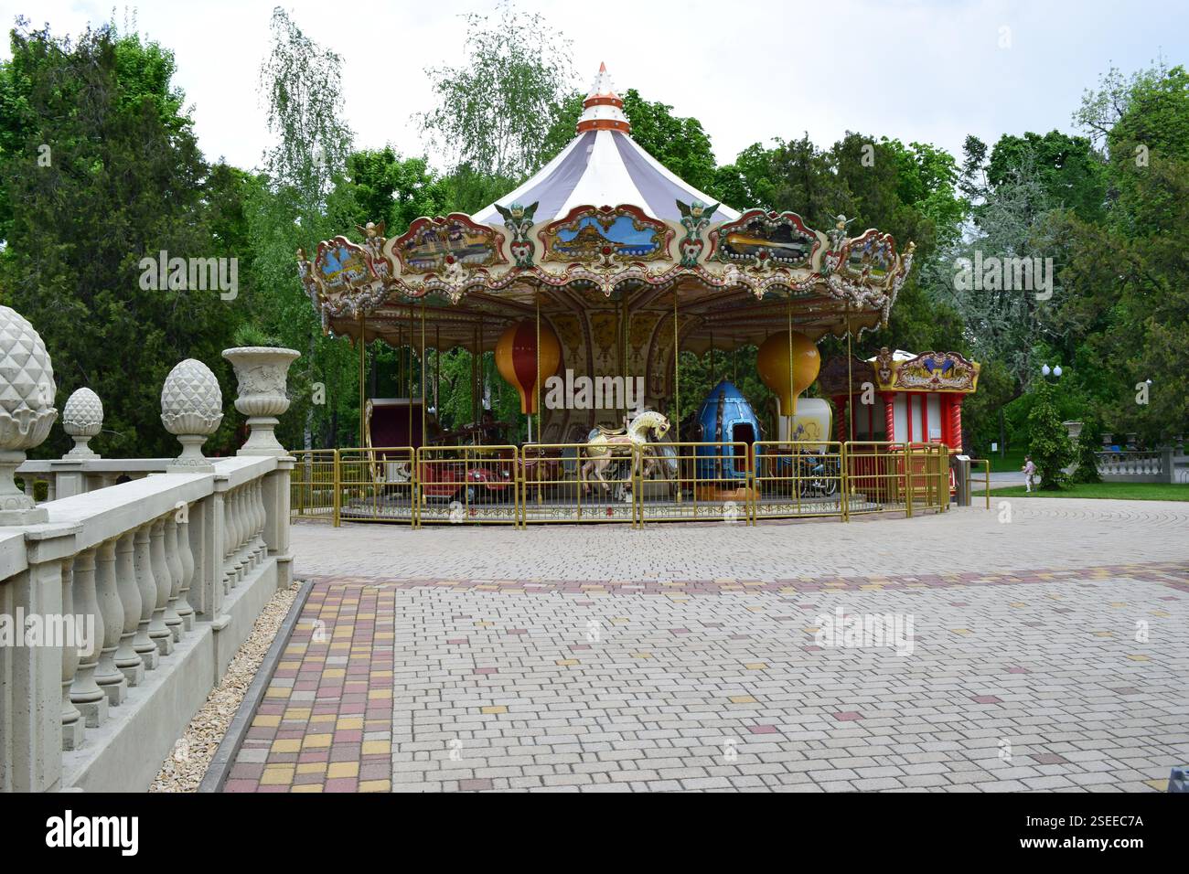 Kharkov, Ukraine, 14 May 2024. A traditional carousel in an outdoor ...