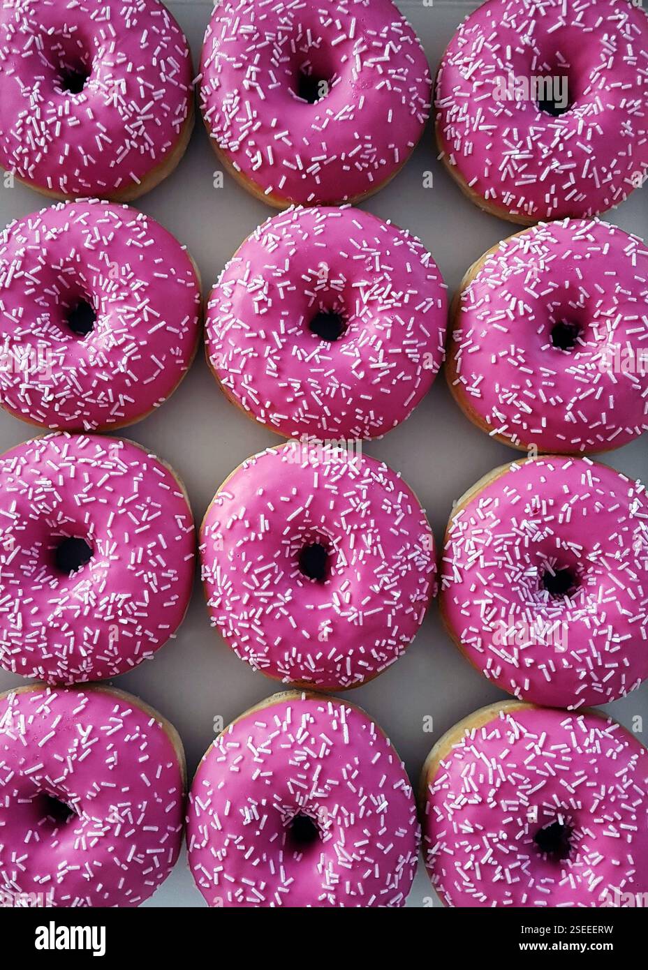 assorted pink donuts top view Stock Photo - Alamy