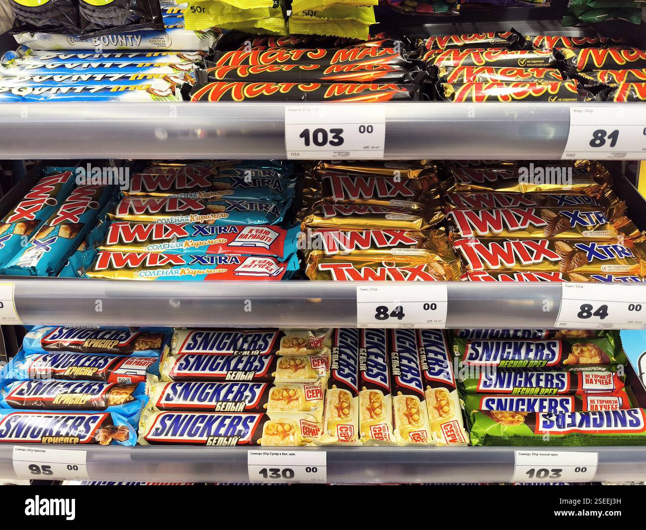 Assorted chocolate bars displayed in grocery store aisle Stock Photo ...