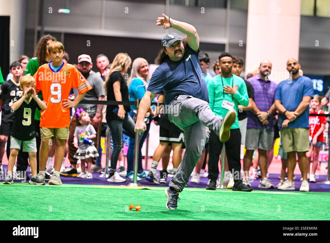 New Orleans, USA. 08th Feb, 2025. Attendees participate in extra point ...