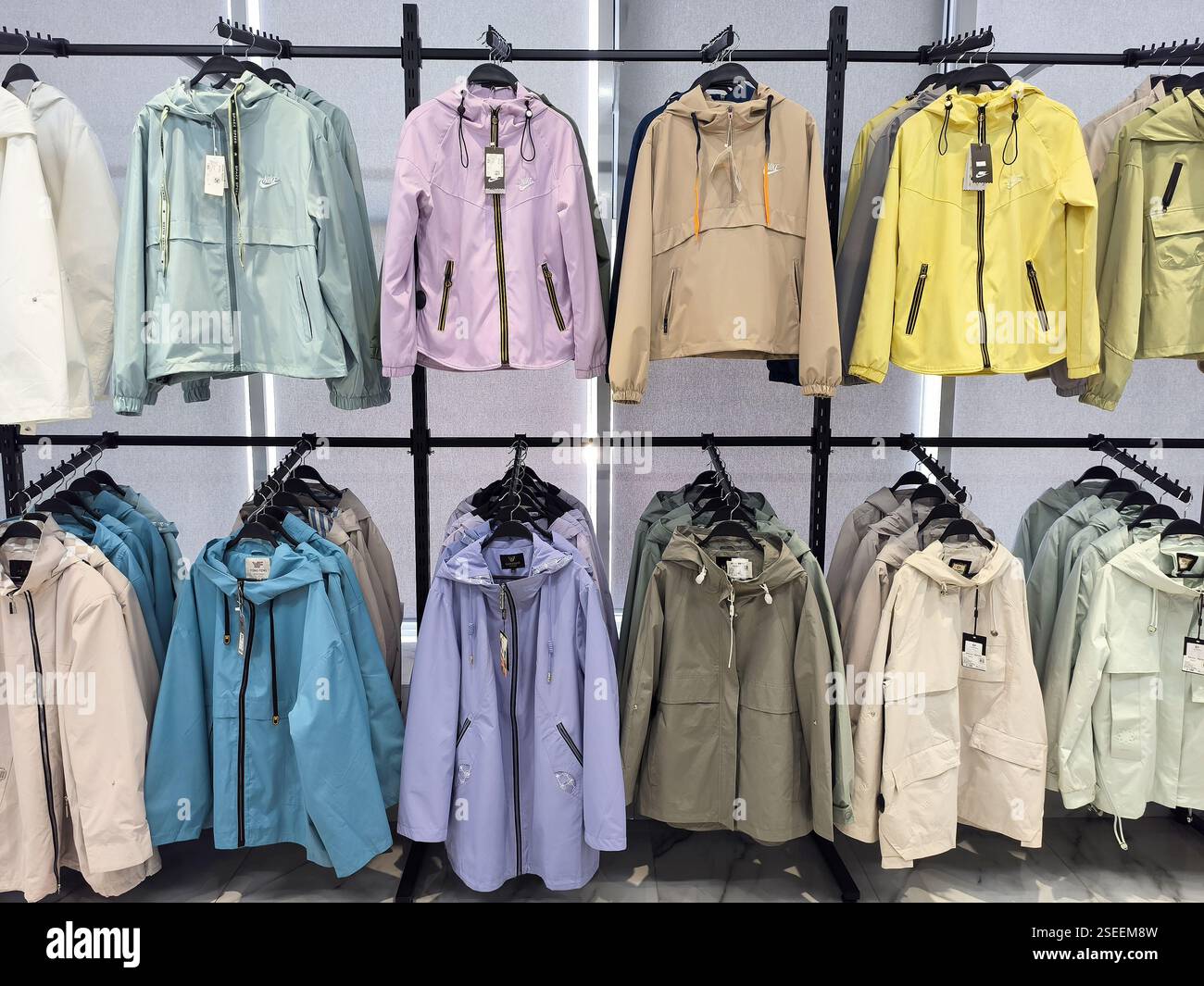 Rain coat hanging hi-res stock photography and images - Alamy