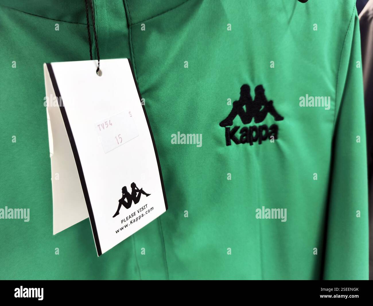 Green kappa jacket with logo and size tag Stock Photo - Alamy