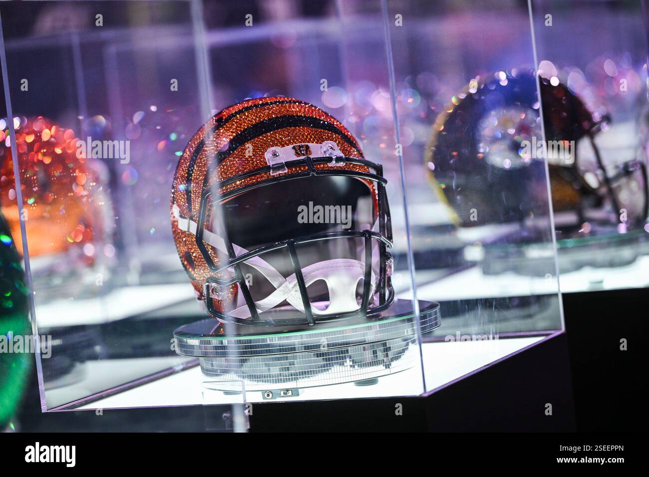 NFL helmets covered in jewels on display in the NFL Super Bowl LIX Fan ...