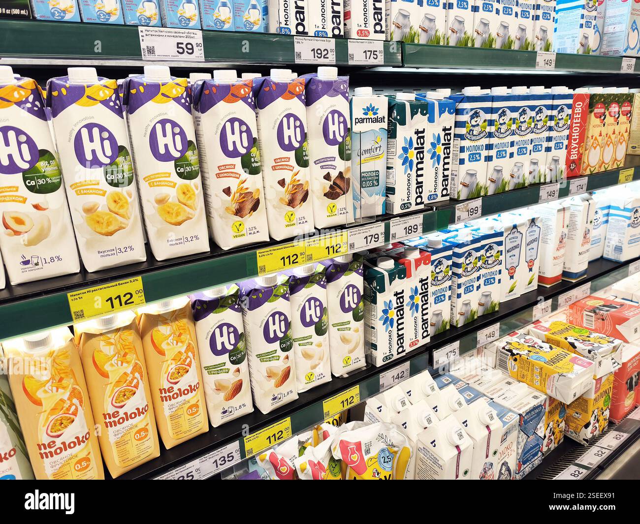 Variety of non-dairy milk cartons on supermarket shelf Stock Photo - Alamy