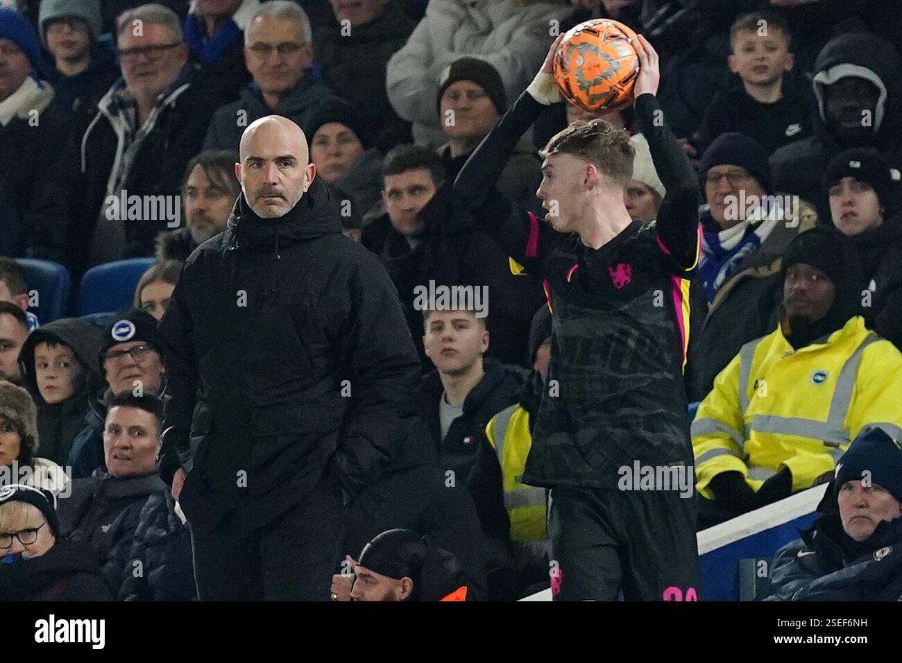 Chelsea manager Enzo Maresca (left) watches on from the touchline as ...