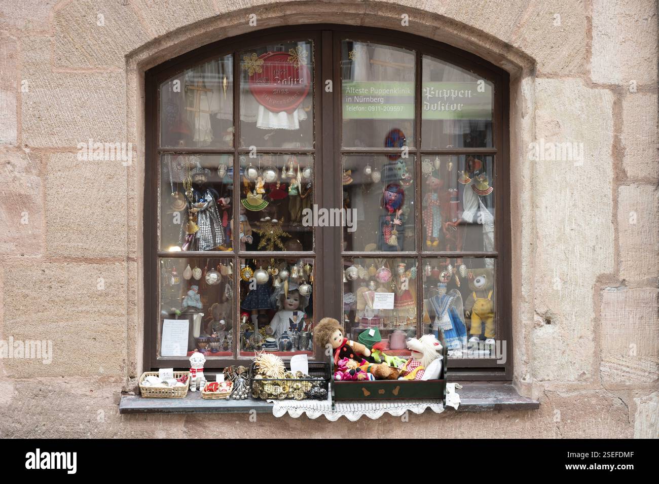 Shop window of a doll shop in the historic city centre, Nuremberg ...