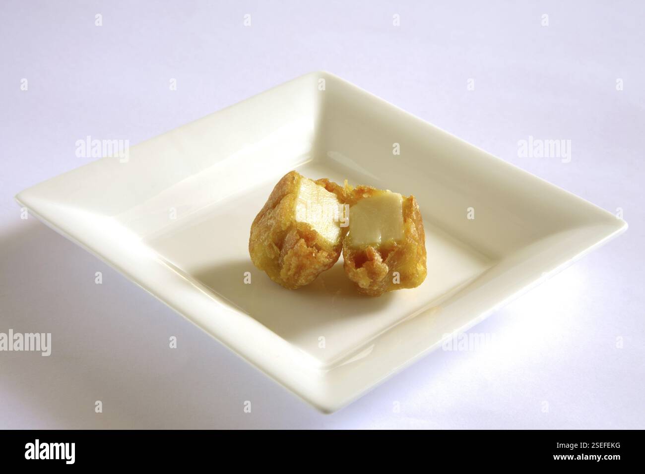 Indian cuisine, fast food starters Cheese Pakode puffs served in dish ...