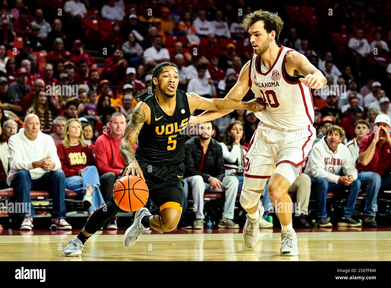 Tennessee guard Zakai Zeigler (5) drives against Oklahoma forward Sam ...