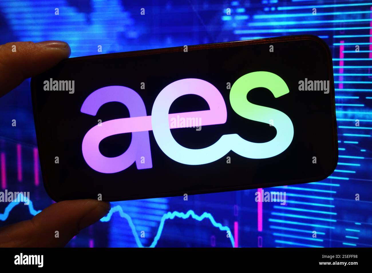 In this photo illustration, the AES Corporation company logo is seen ...