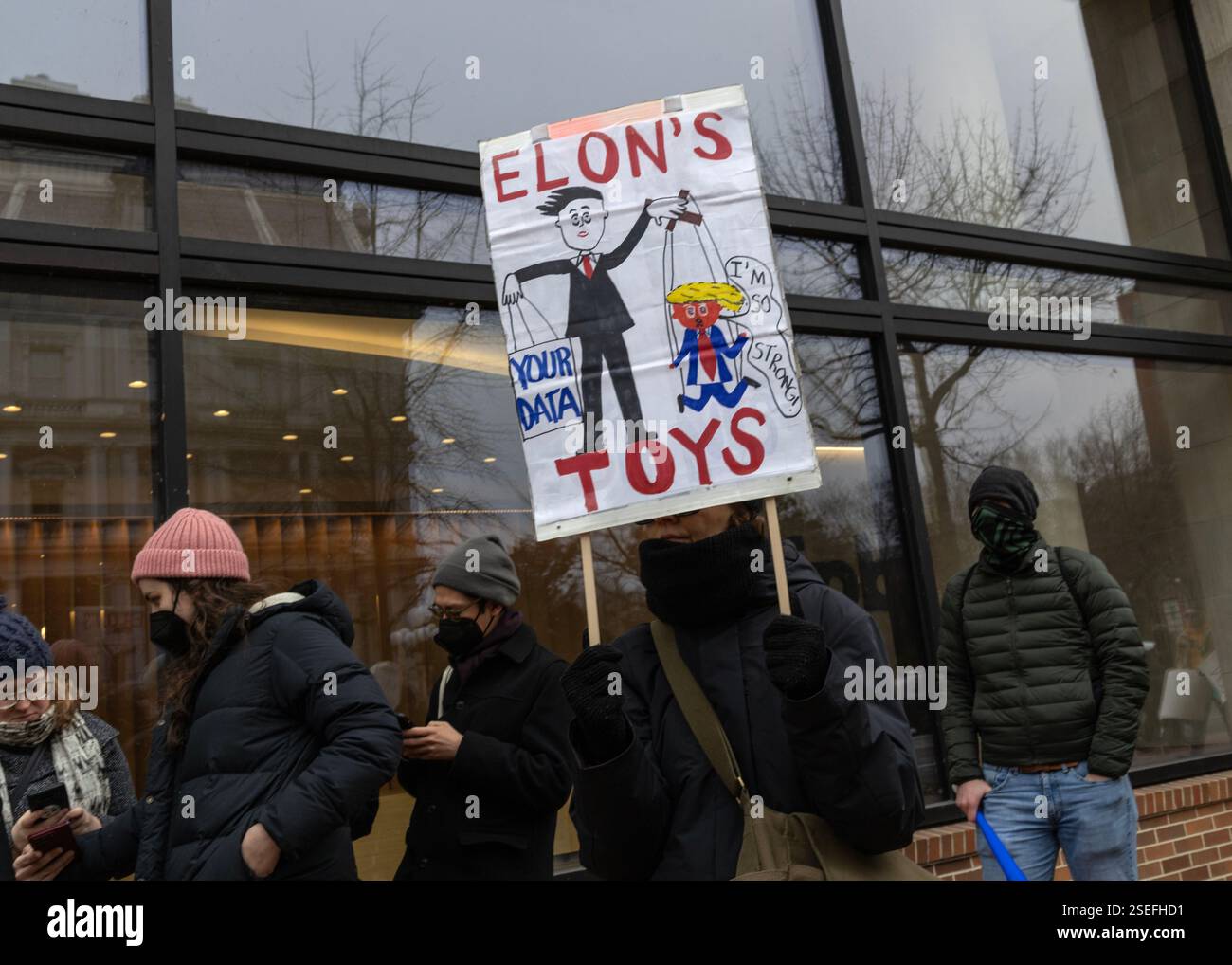 Dozens of employees of the U.S. Consumer Financial Protection Bureau ...