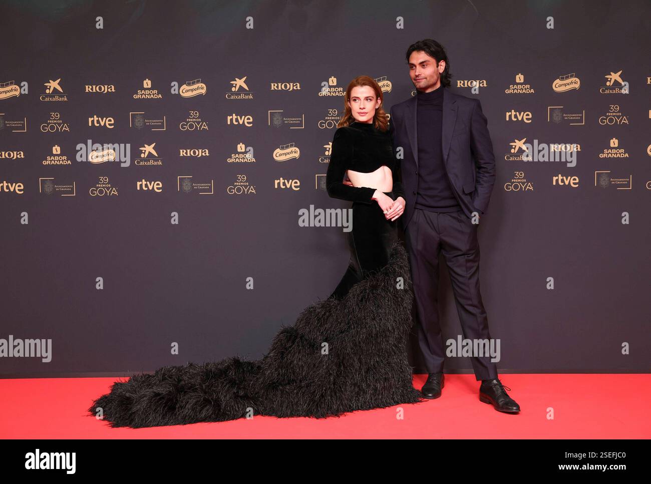 Rocio Suarez de Puga, from left, and Marco Pernas pose for ...