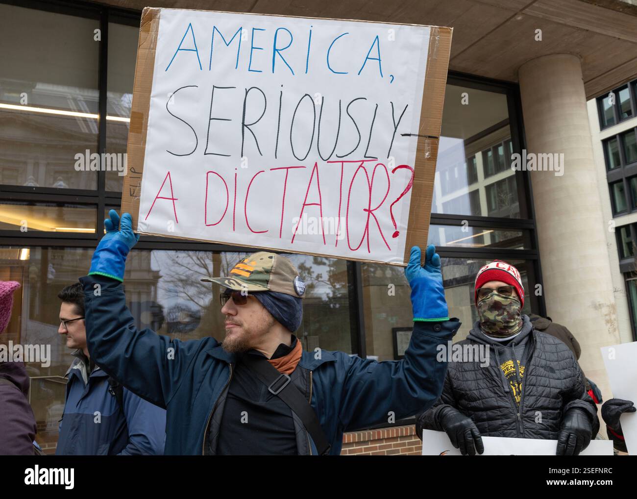 Dozens of employees of the U.S. Consumer Financial Protection Bureau ...
