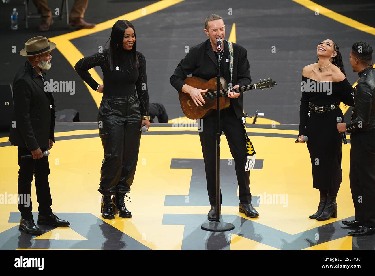Chris Martin and members of the Universal Gospel Choir perform at the ...