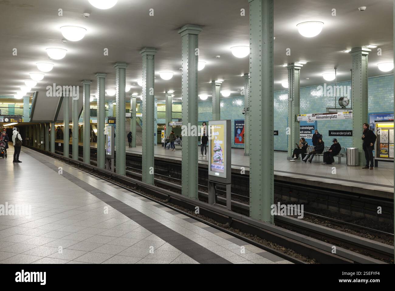 Passengers at Alexanderplatz underground station waiting for the ...