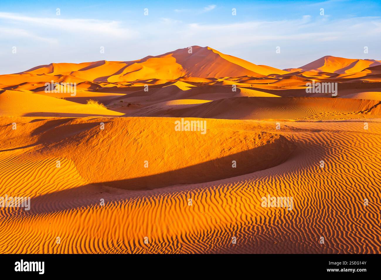 Golden sand dunes of Sahara desert in Erg Chebbi at susnet time near ...