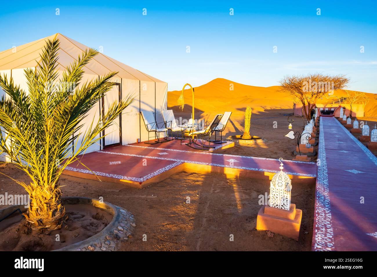 Luxury tent camp at Erg Chebbi Sahara desert at sunrise near Merzouga ...