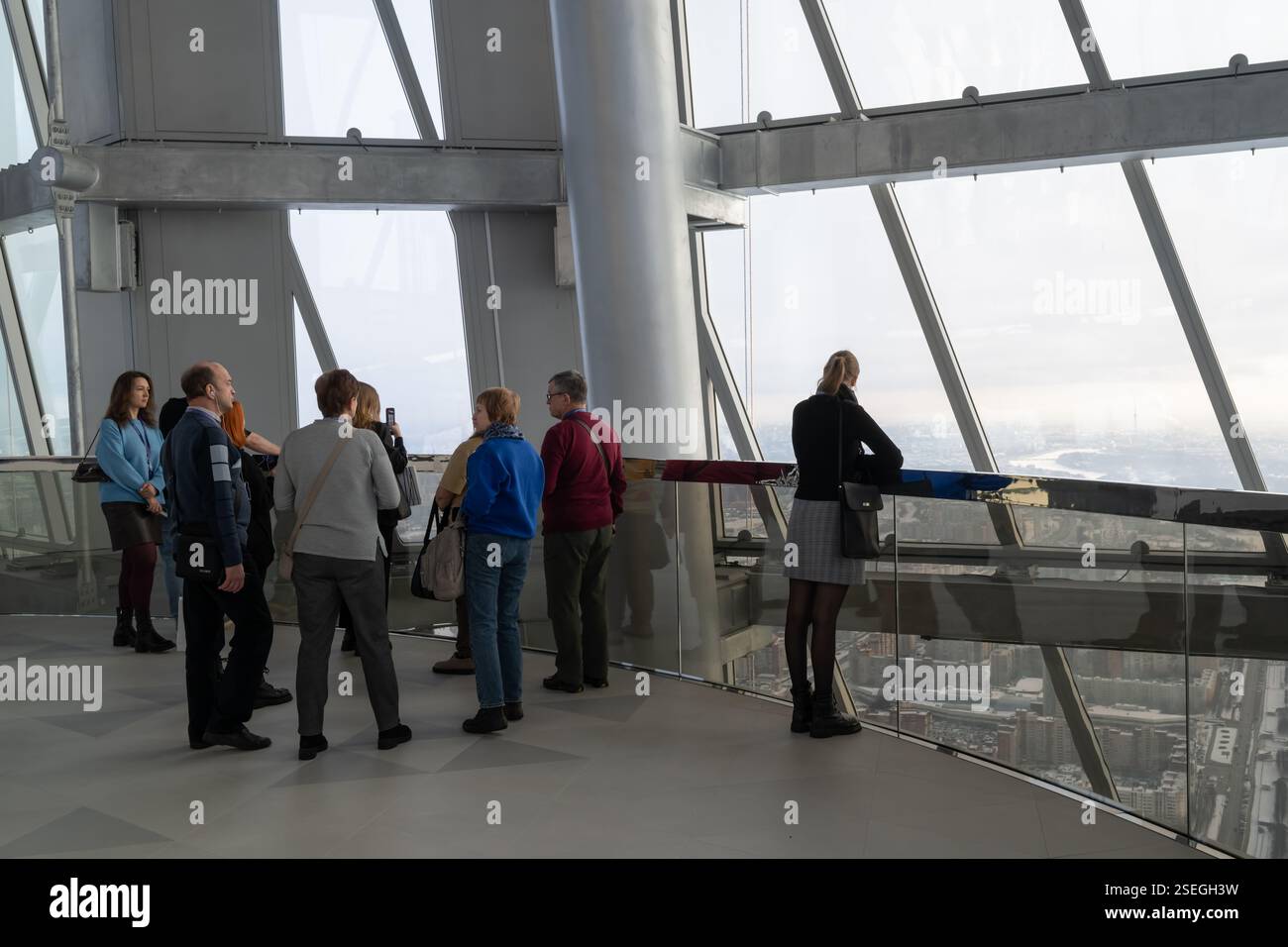 Visitors on a tour seen at the observation deck on the 83rd floor of ...